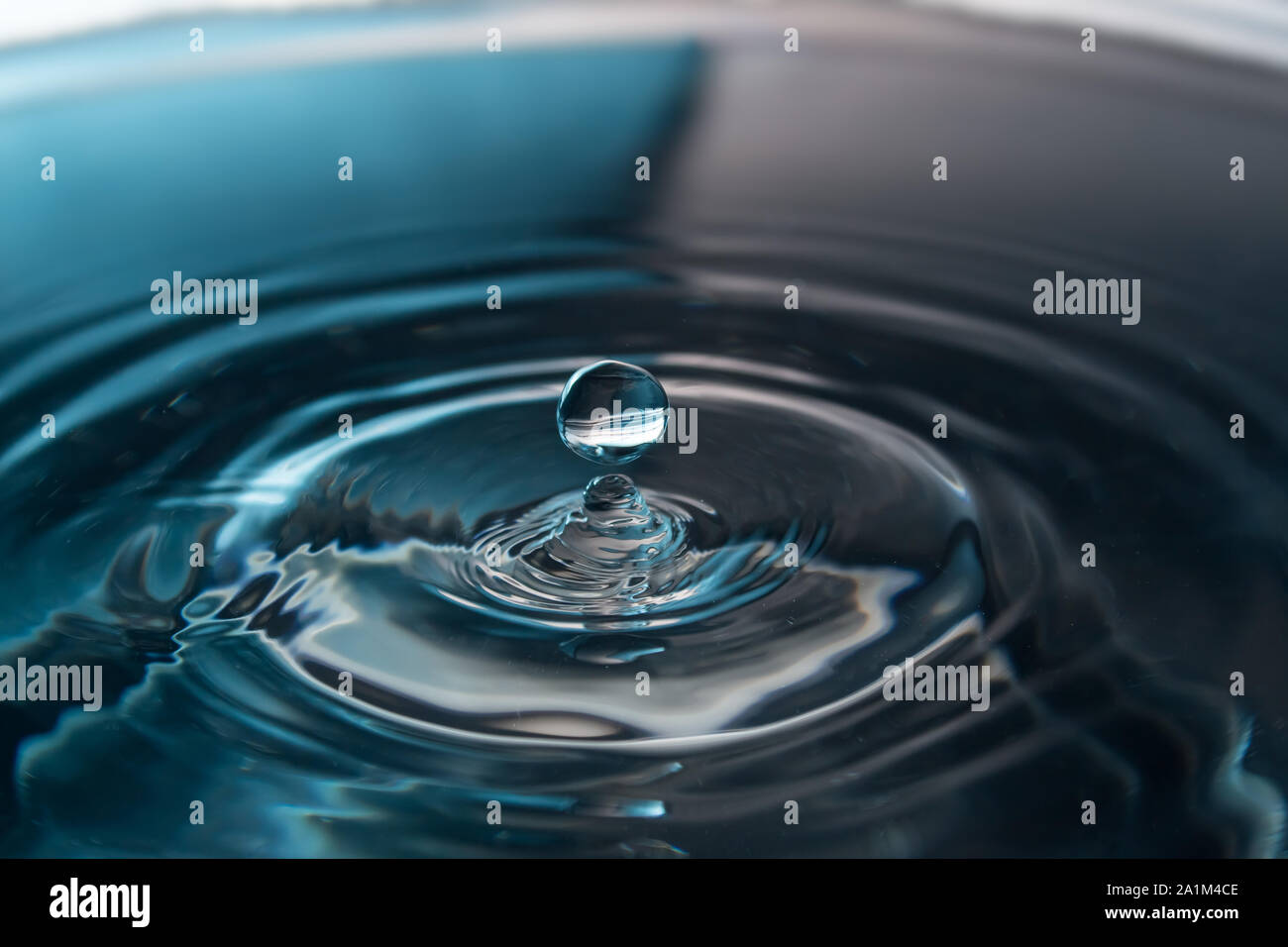 Water splash or drop. Water splash close-up. Blue water drop. Falling ...