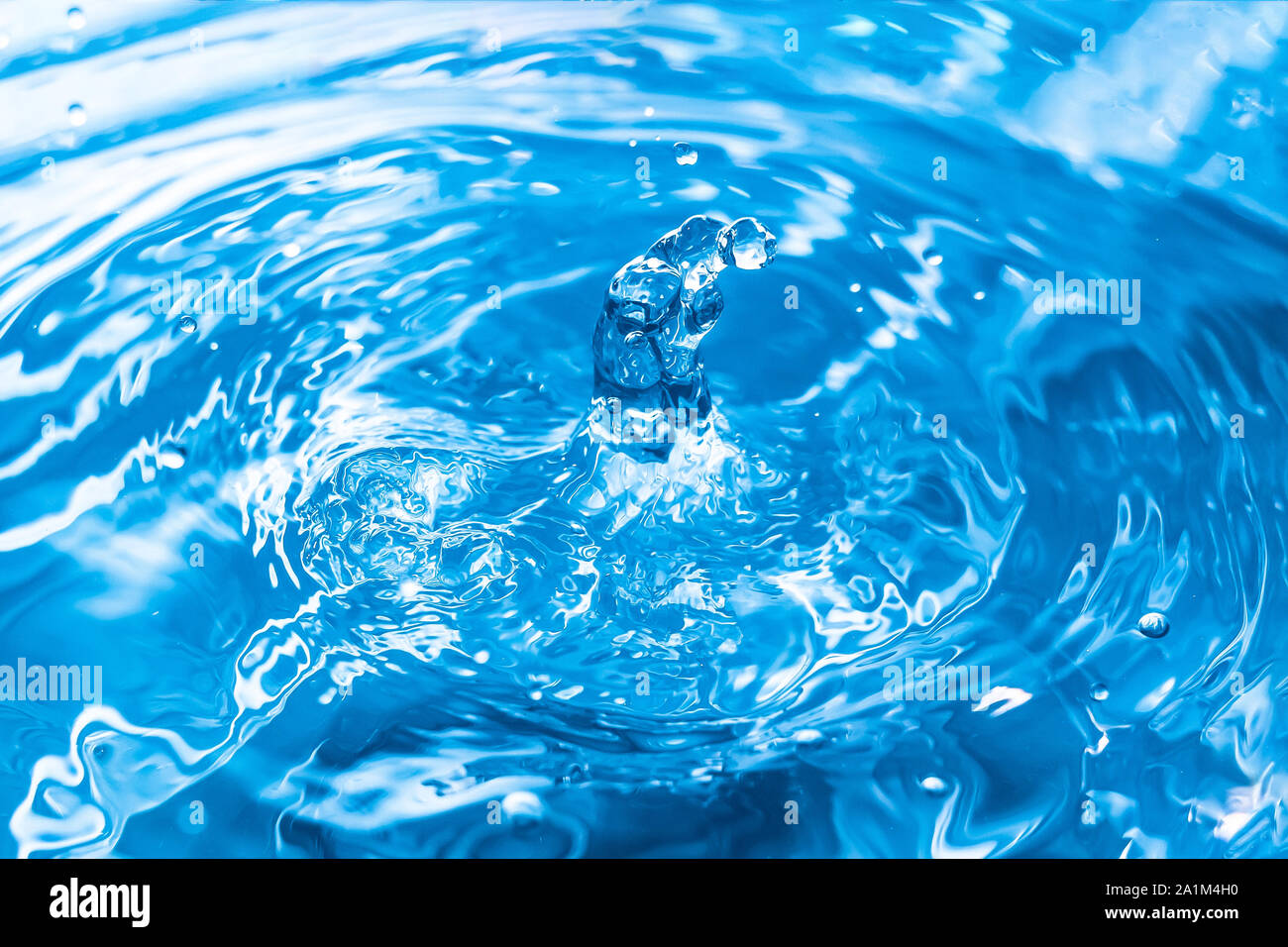 Water splash or drop. Water splash close-up. Blue water drop. Falling ...