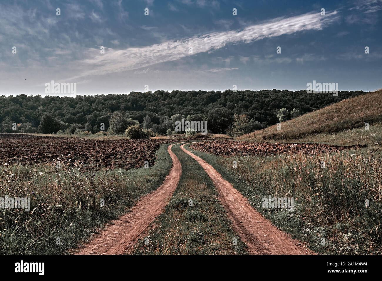 Country road. Rural road in the hills. Alternate colors and colour ...