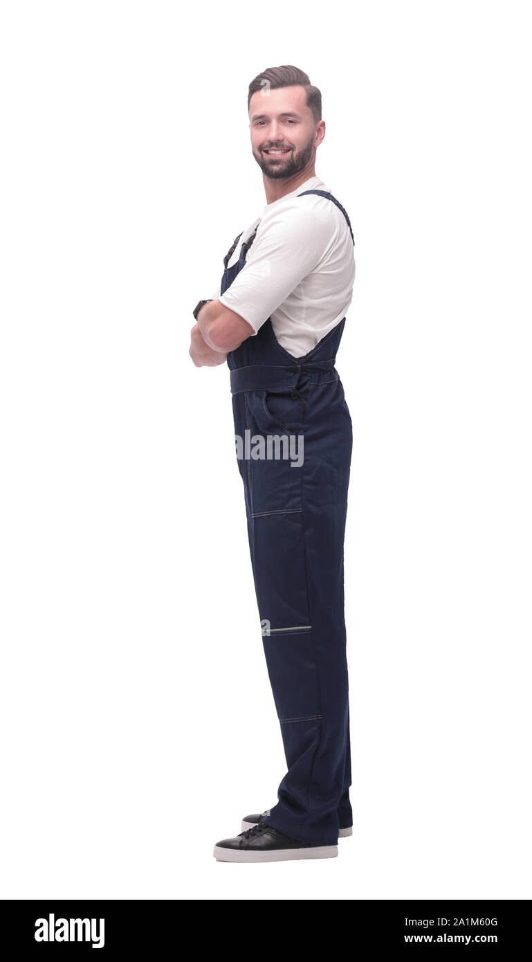 side view. confident man in overalls looking forward Stock Photo - Alamy