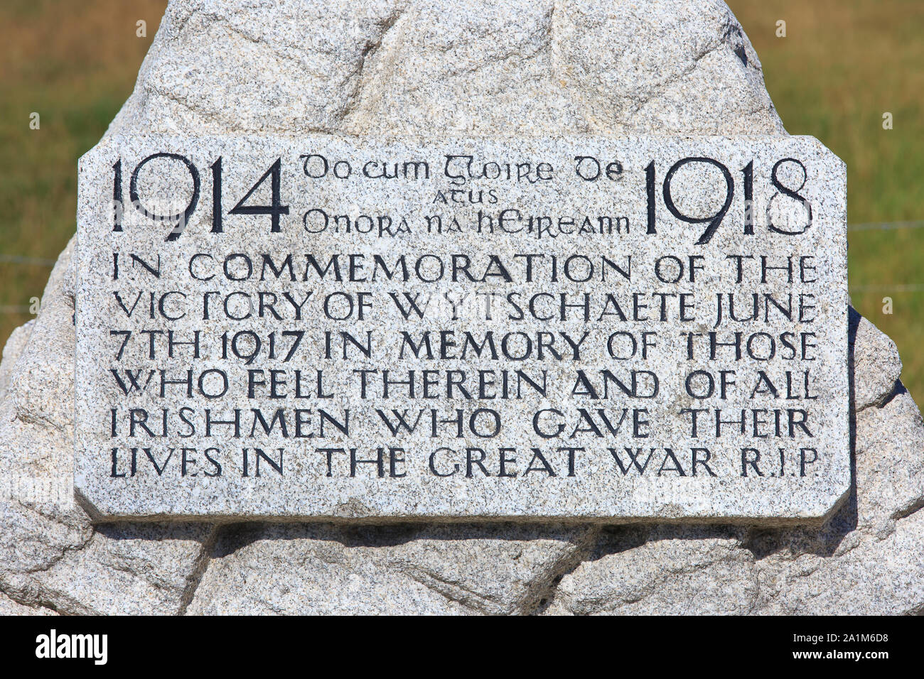 Close-up of the commemorative plaque at the foot of the Celtic cross ...
