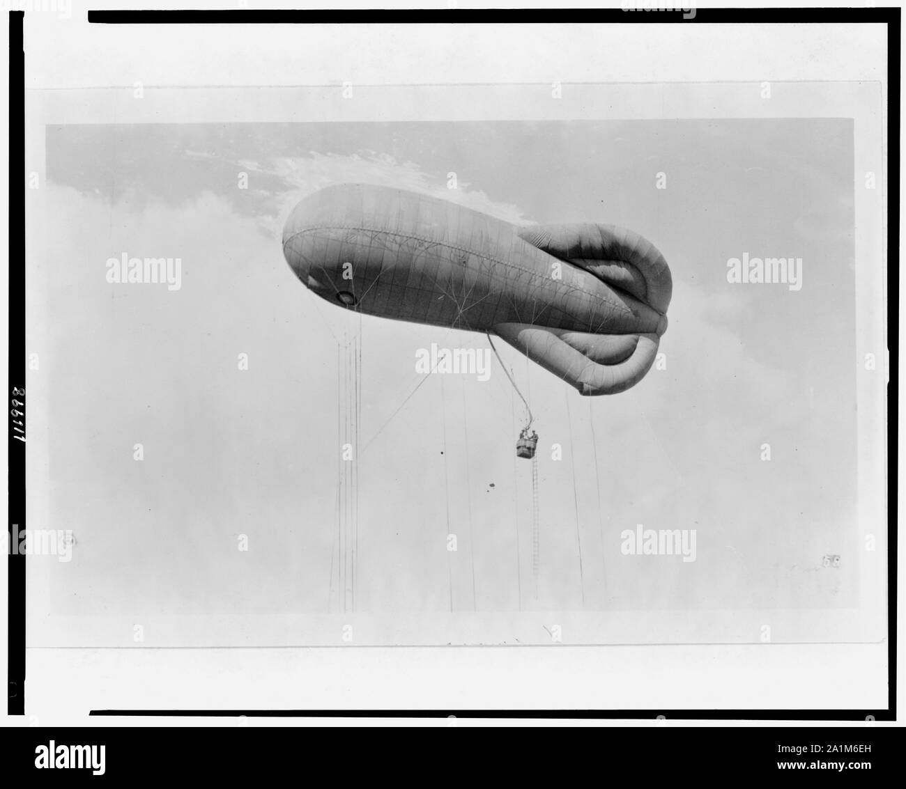 Observation kite balloon in air with basket (gondola) suspended below ...