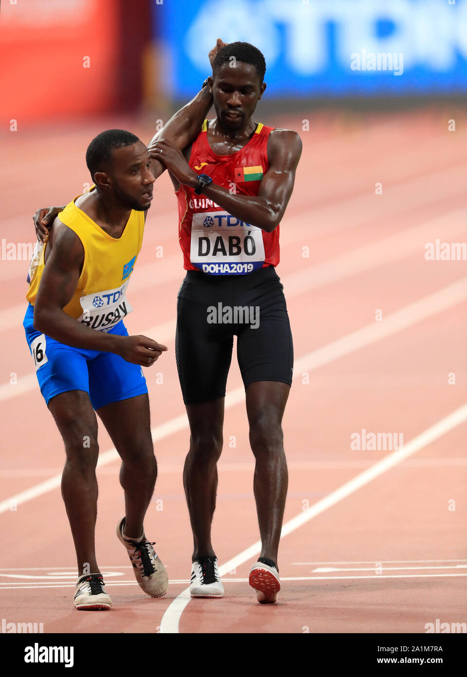 Guinea-Bissau's Braima Suncar Dabo carries Aruba's Jonathan Busby over ...