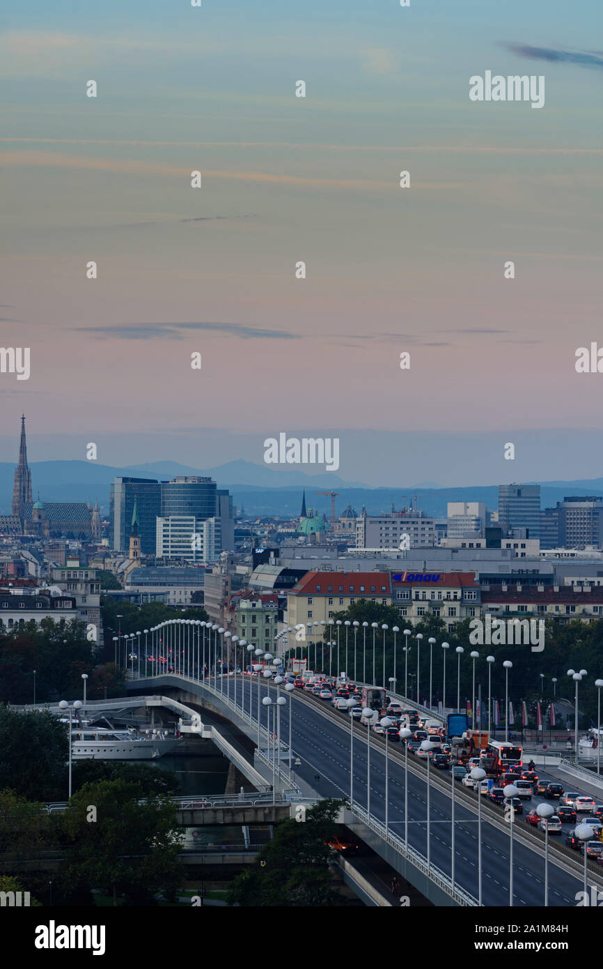 Wien, Vienna: bridge Reichsbrücke, traffic jam, church Stephansdom (St ...