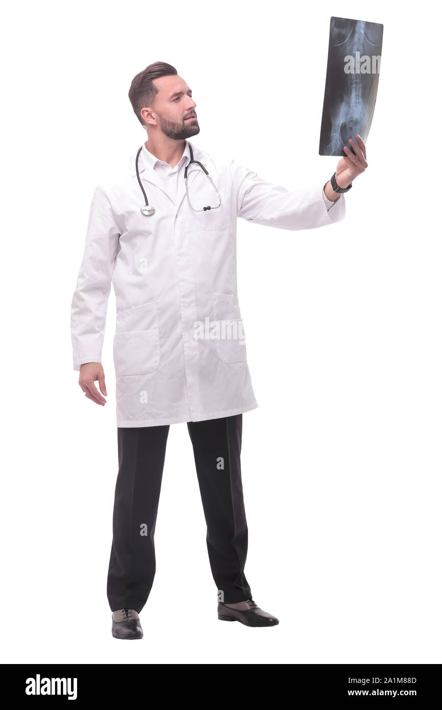 in full growth. medical doctor looking closely at the x-ray Stock Photo ...