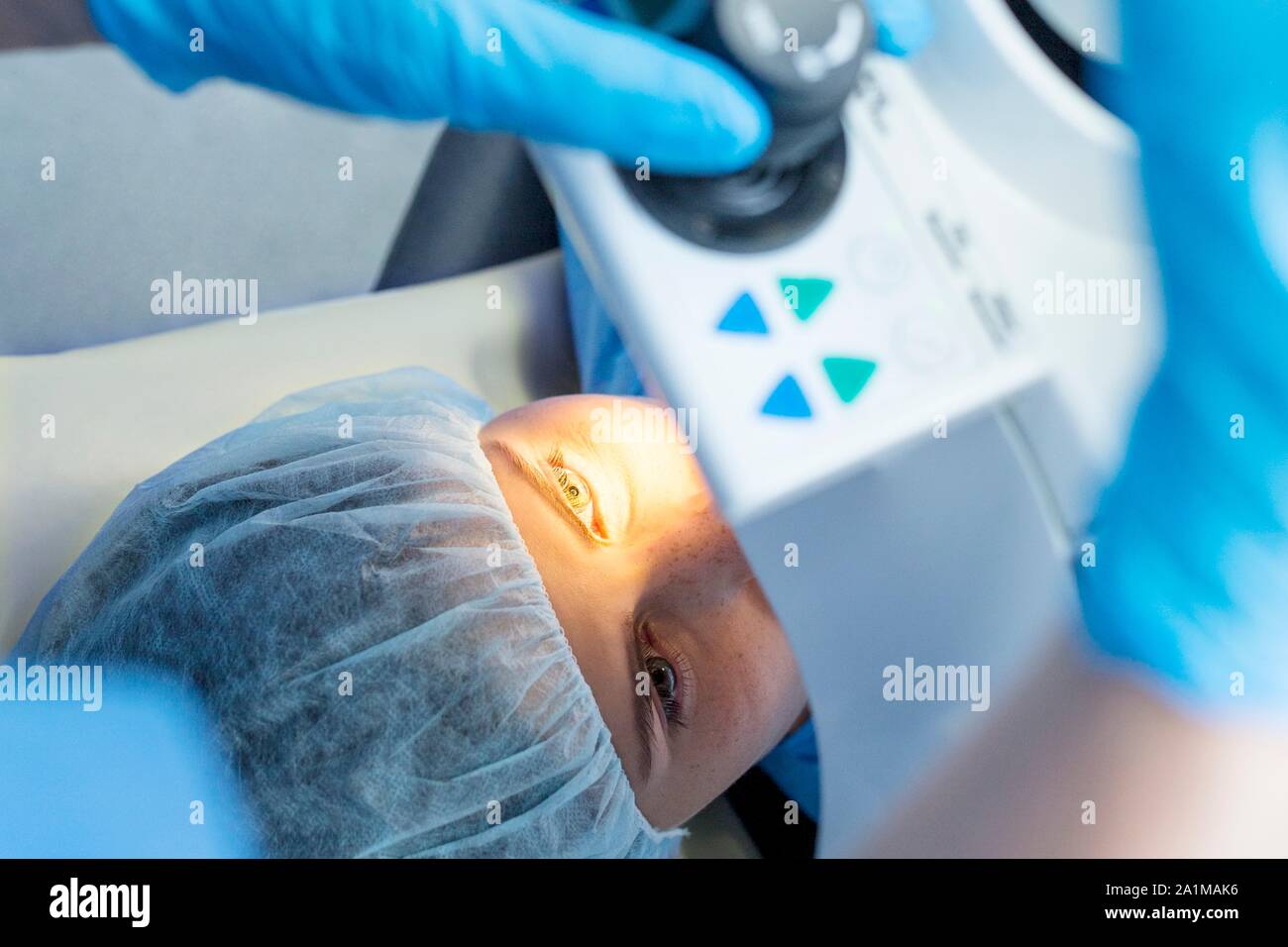 Patient undergoing laser eye surgery Stock Photo - Alamy