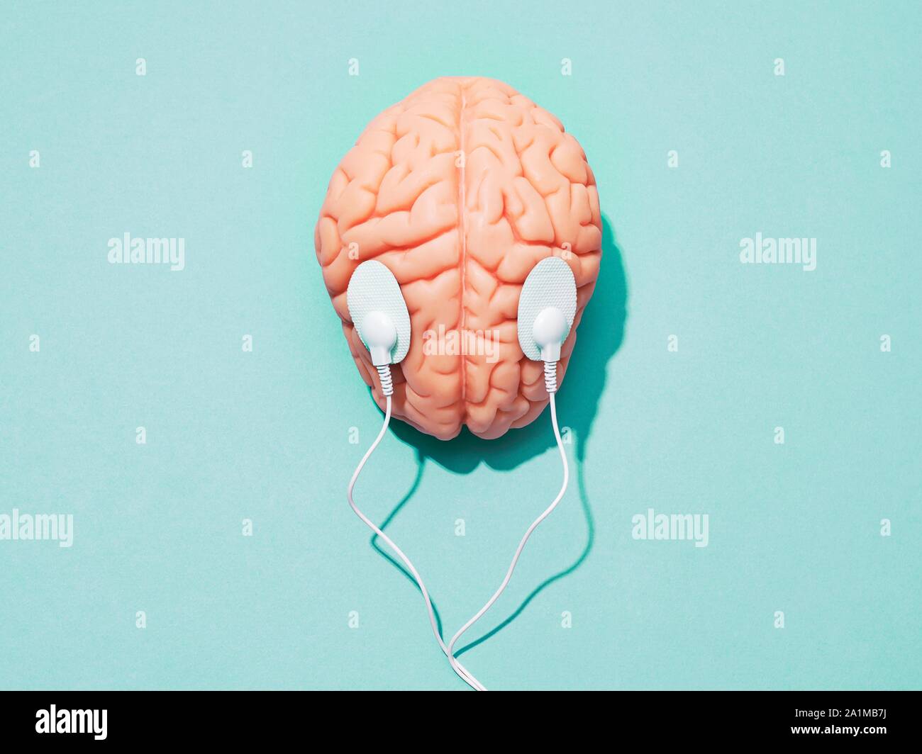 Brain stimulation, conceptual image. Brain and electrodes Stock Photo ...