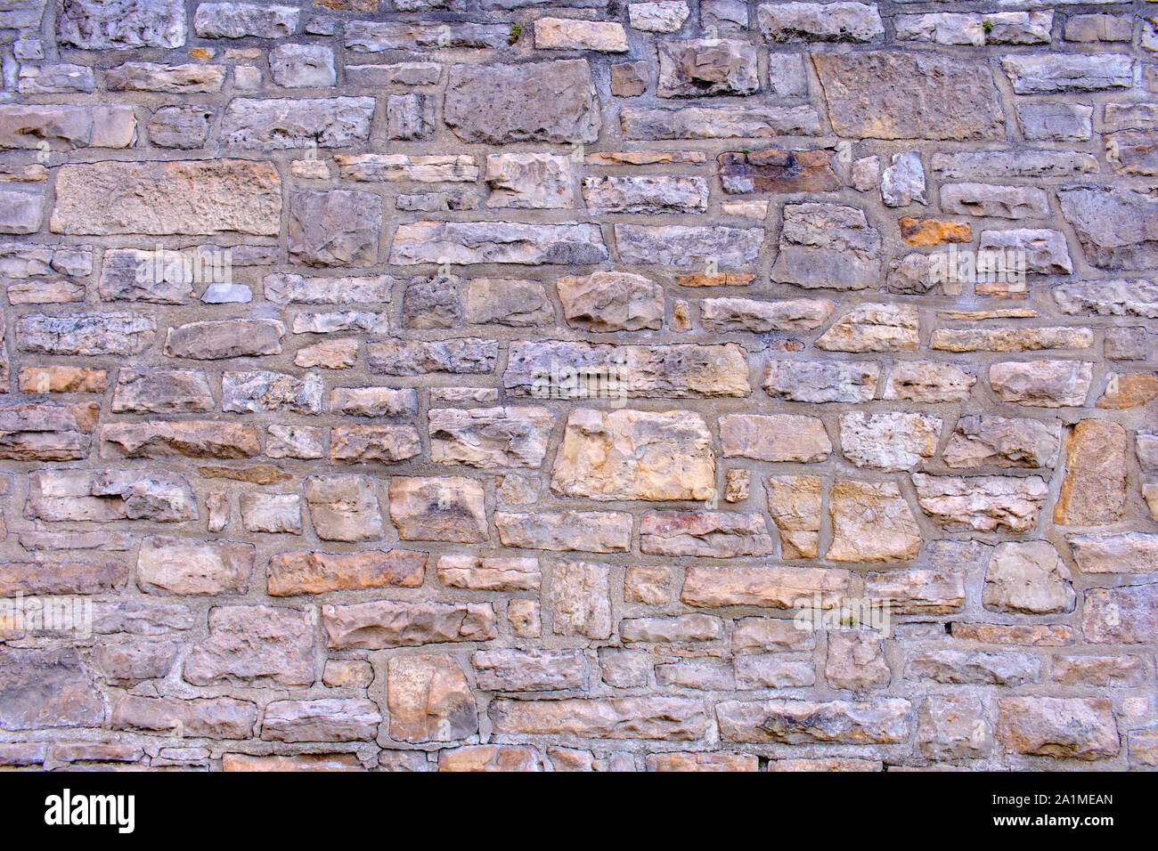 traditional dry stone wall of churchyard in germany with room for copy ...