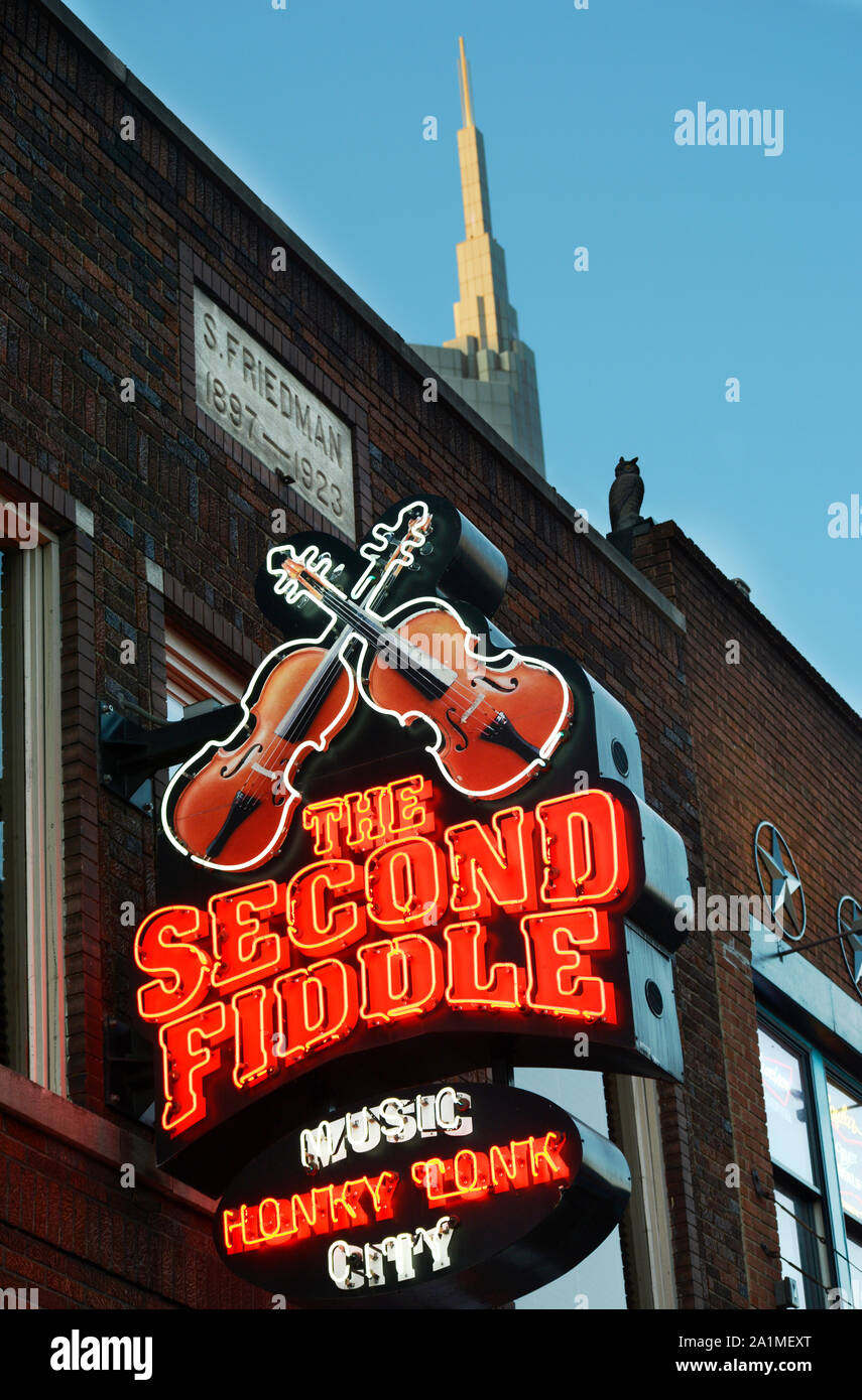 A neon sign glows over the entrance to the Second Fiddle bar and music ...