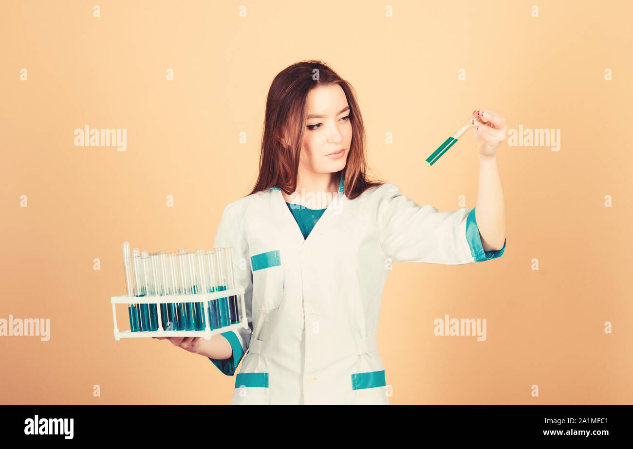 Nurse doctor scientist with test tubes. Experimental treatment concept ...