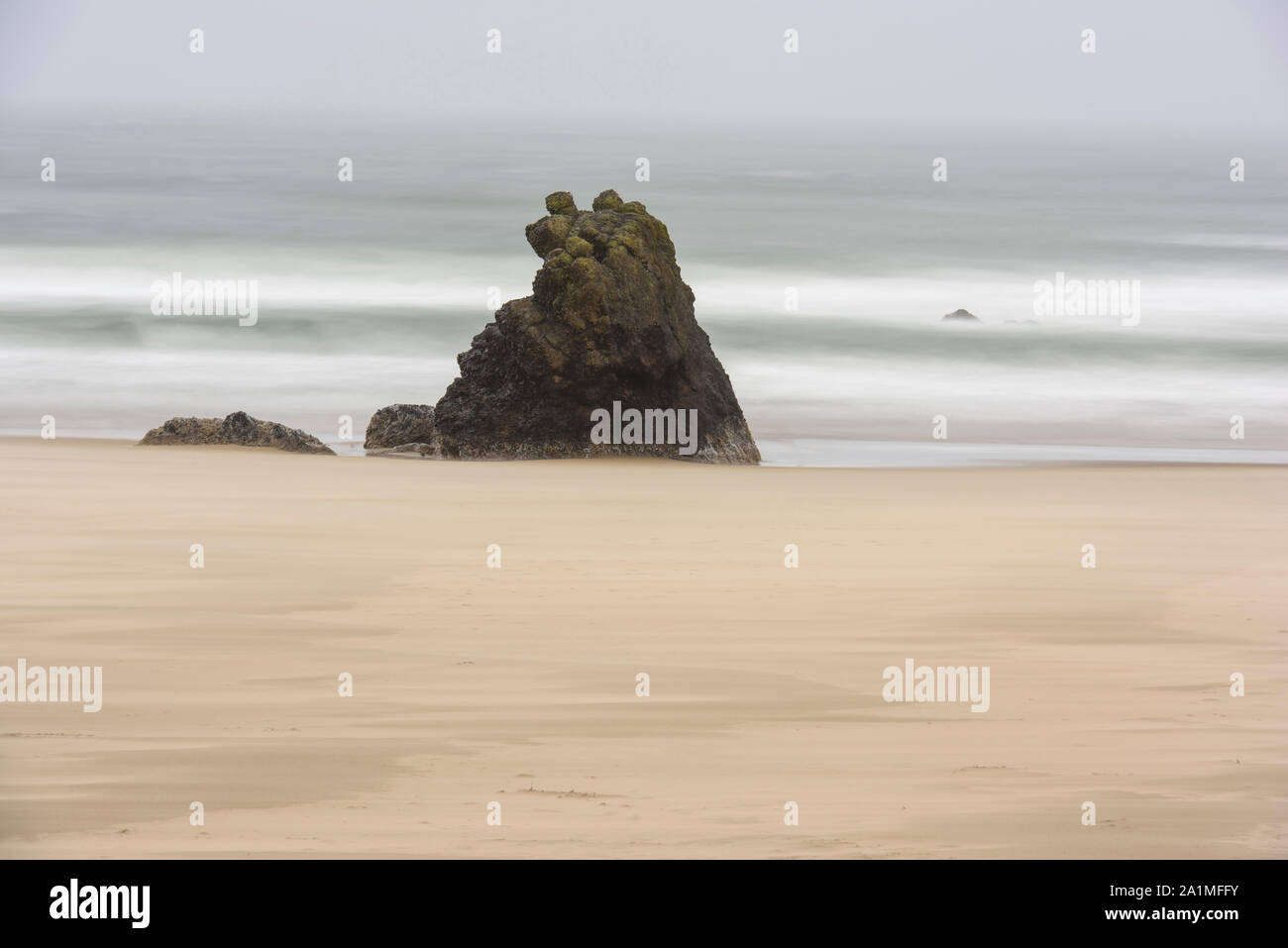 Sea stack and sand beach, Cannon Beach, Oregon, USA Stock Photo - Alamy