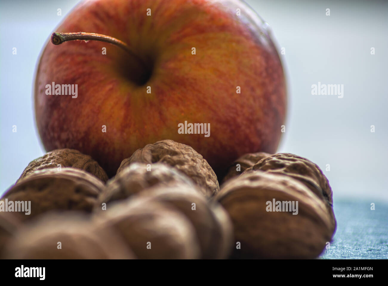 Apple and nuts Stock Photo - Alamy