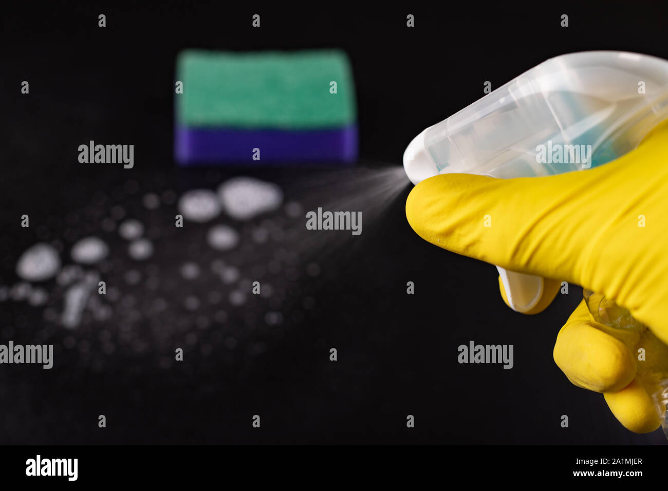 Cleaning dark surfaces with liquid and a sponge. Chores. Dark ...