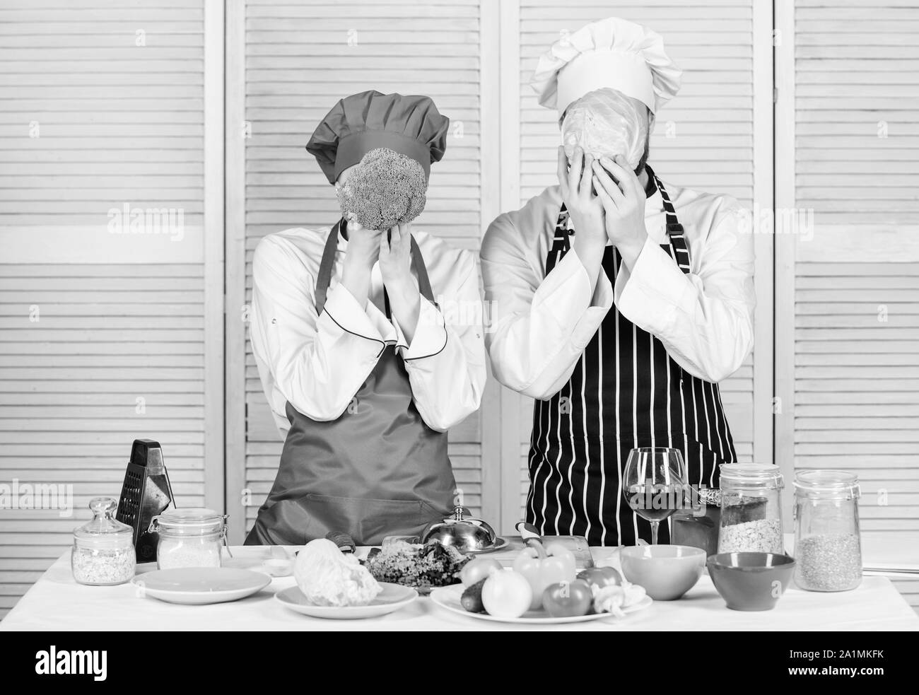 Healthy food concept. Couple cooking healthy vegetarian meal ...