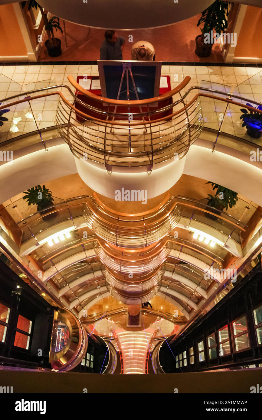 Atrium with elevator on a cruise ship Stock Photo - Alamy