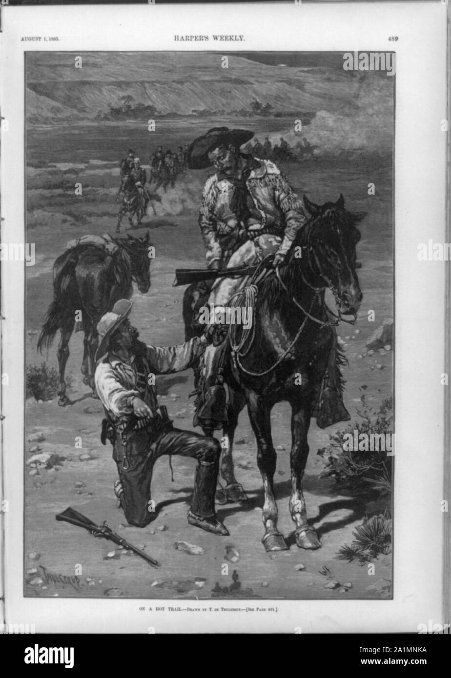 On a hot trail [Scout pointing out tracks to another scout, Gen. Miles ...