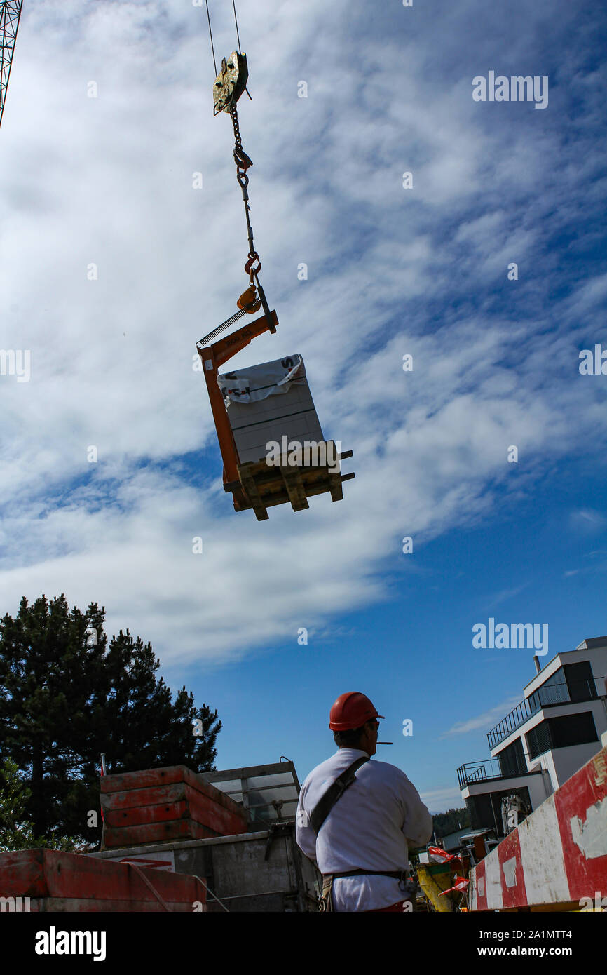 Hard working people at construction site Stock Photo - Alamy