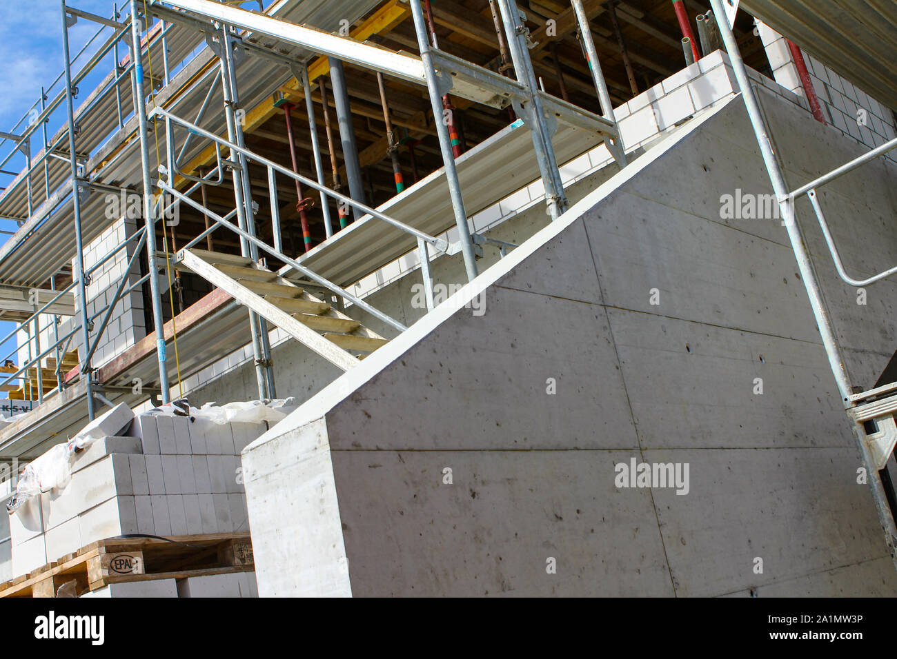 Hard working people at construction site Stock Photo - Alamy