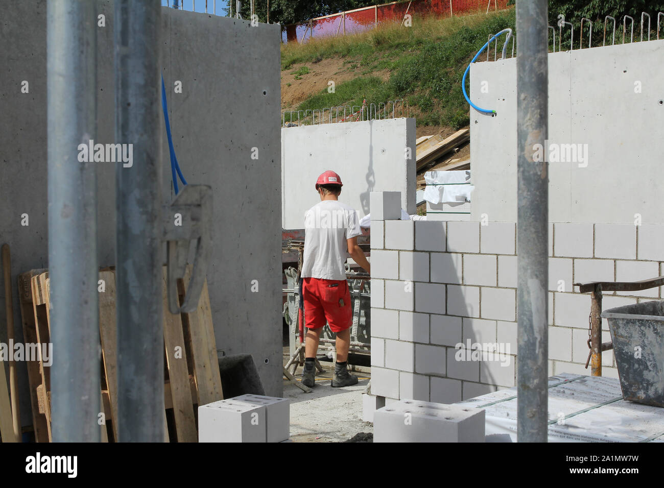 Hard working people at construction site Stock Photo - Alamy