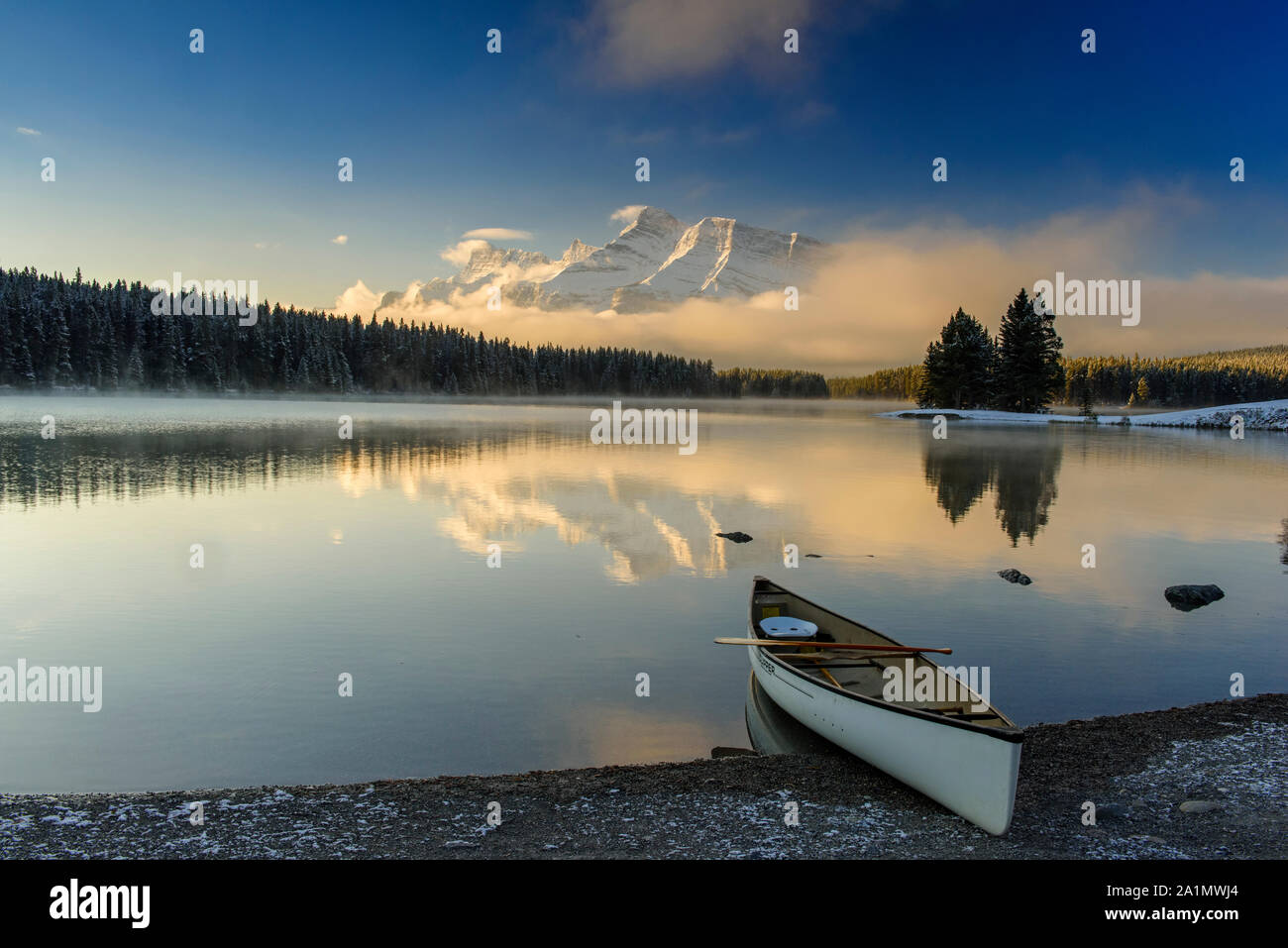 Canoe on the shore of Two Jack Lake, Banff National Park, Alberta ...