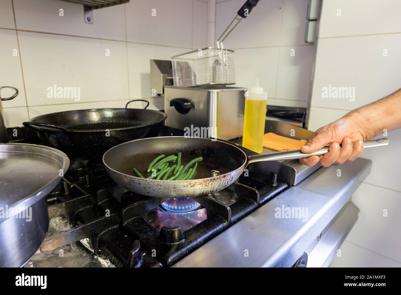 Cooking fire chef hi-res stock photography and images - Alamy