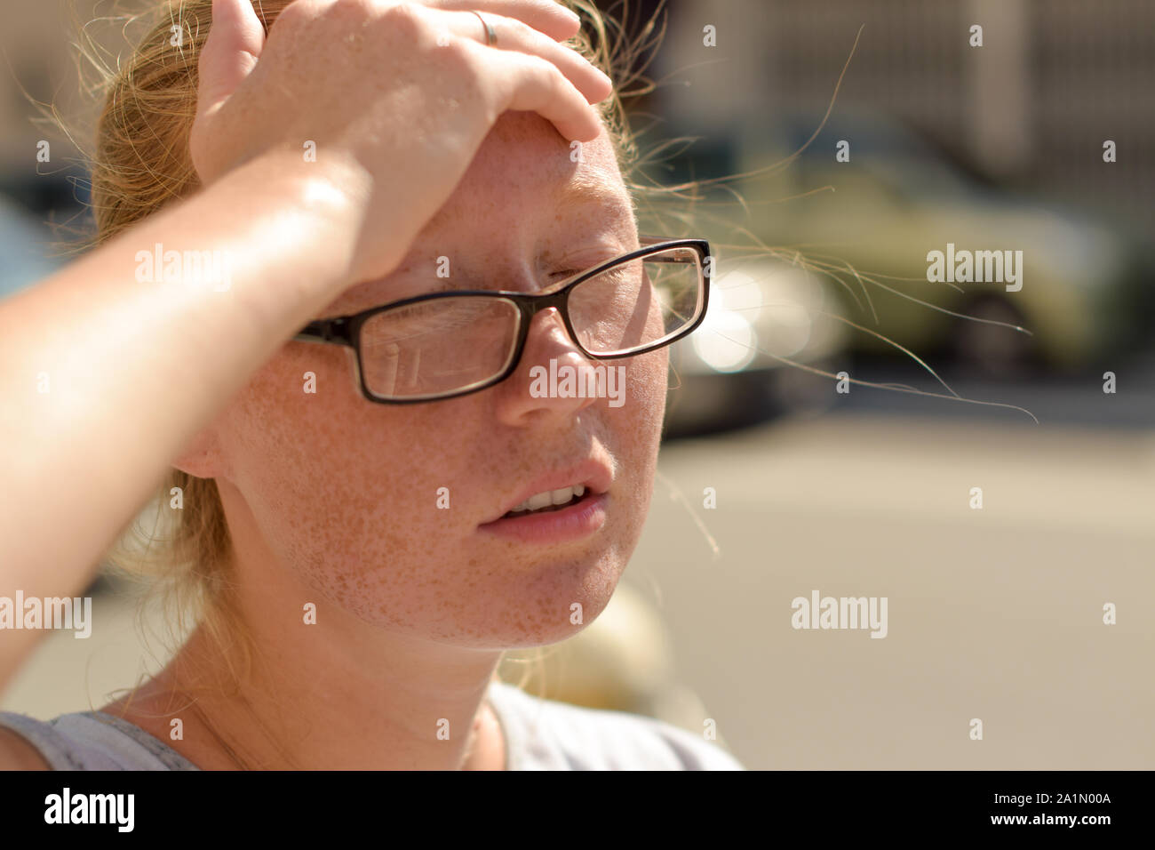 The heat in the city. Sunstroke Stock Photo - Alamy