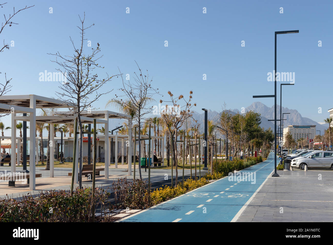 Blue bike path on a seashore promenade in Antalya, Turkey Stock Photo ...