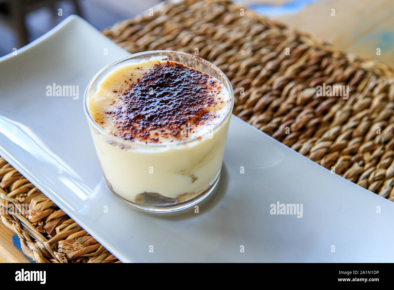 Dessert served in cristal transparent glass, restaurant table setting ...