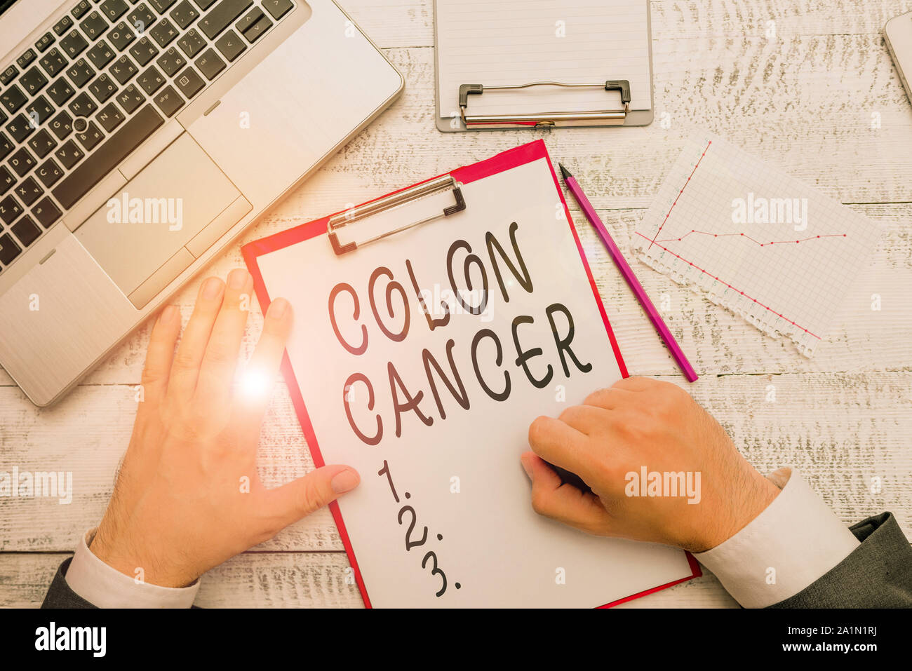 Handwriting text writing Colon Cancer. Conceptual photo the development ...