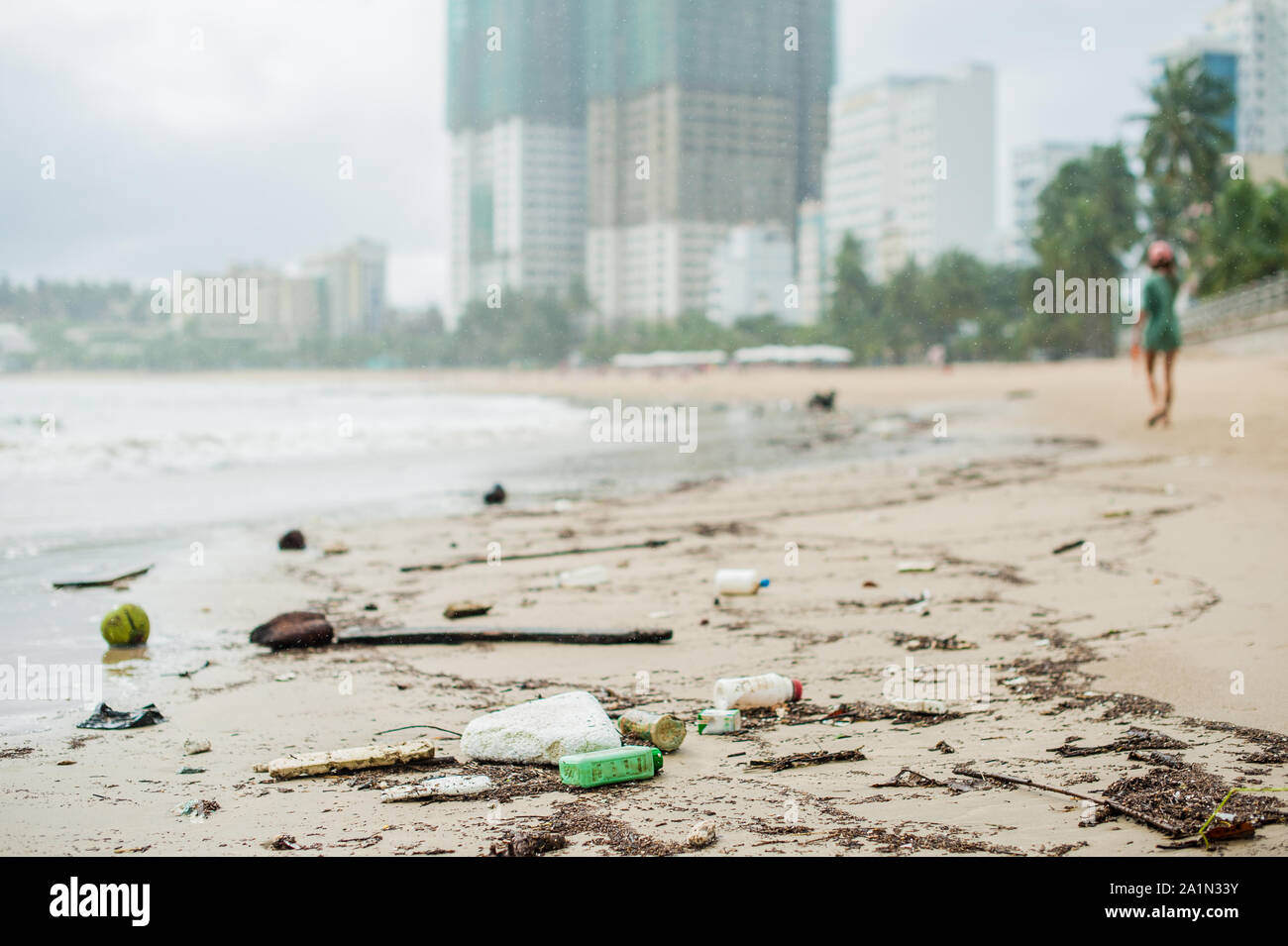 Beach pollution. Plastic bottles and other trash on sea beach Stock ...