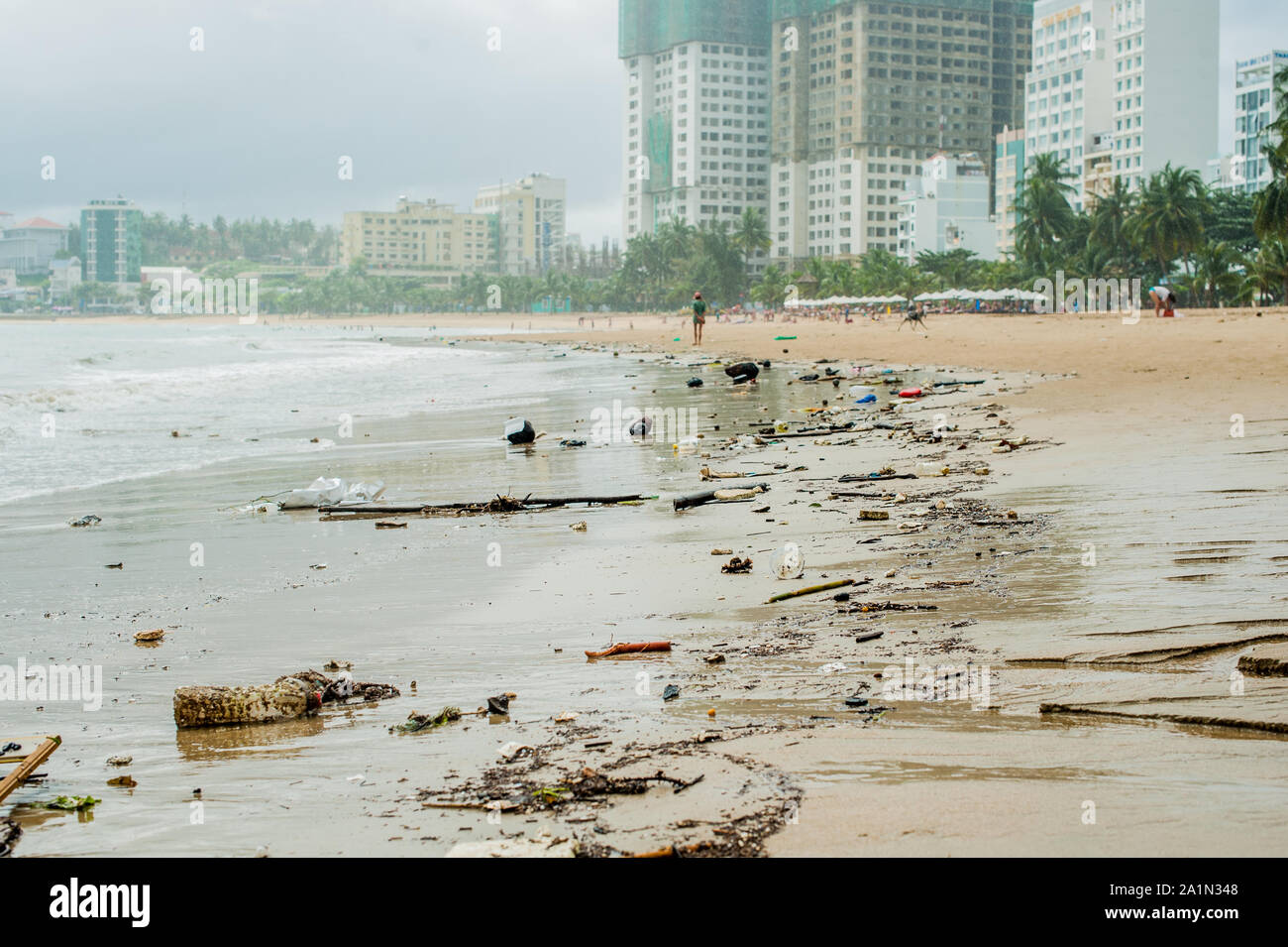Beach pollution. Plastic bottles and other trash on sea beach Stock ...