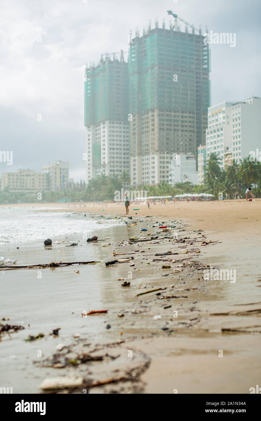 Beach pollution. Plastic bottles and other trash on sea beach Stock ...