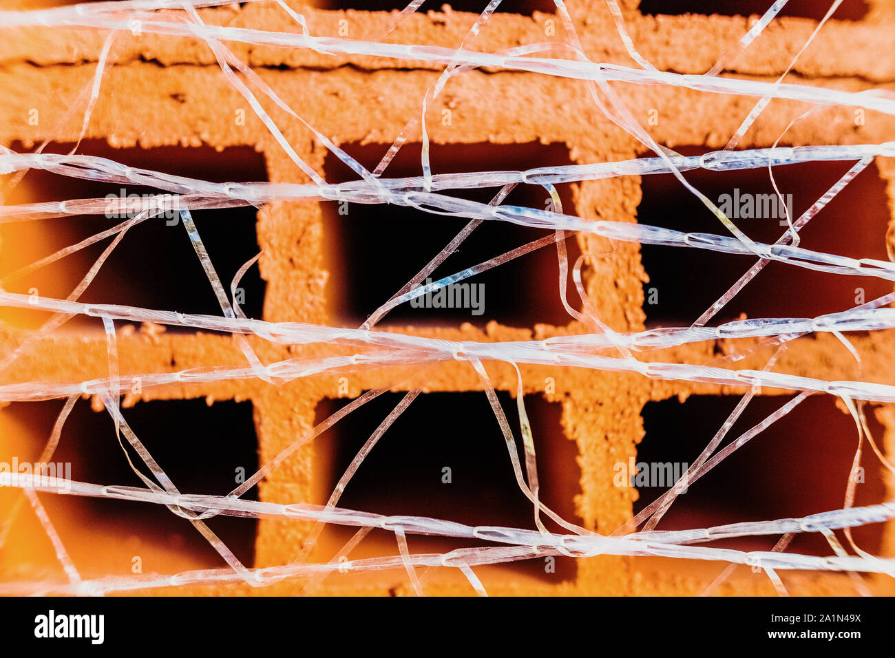 Close-up of a stack of packed bricks, to use as background in ...