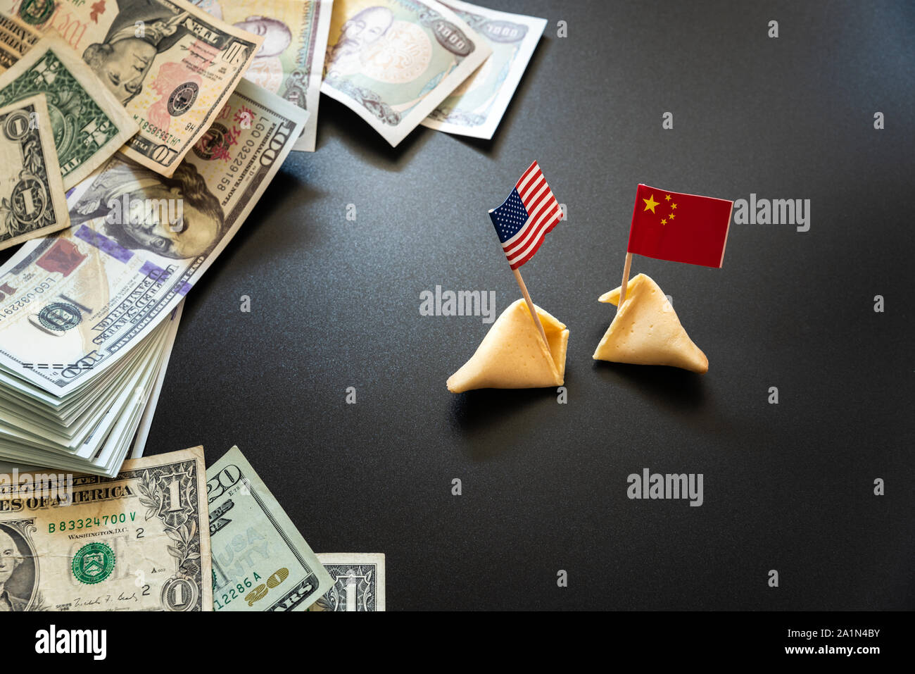 concept of commercial war between USA and China, with dollar bills and ...