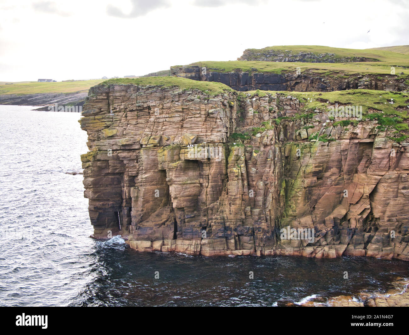 Sandstone cliffs on the East Shetland coast near Levenwick - the ...
