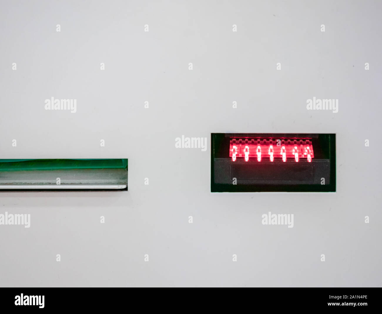 Bill acceptor with a red LED backlight in terminal to pay for a variety ...