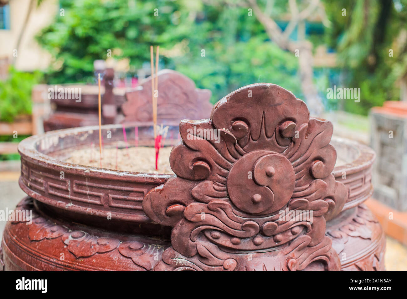 Buddhist prayer sticks inside temple Stock Photo - Alamy