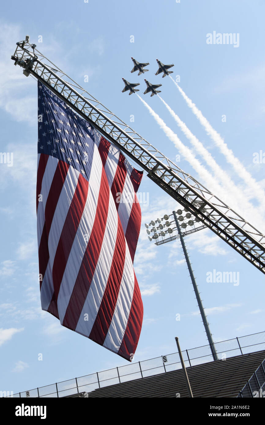 The U.S. Air Force Thunderbirds perform a fly-over of the Cramton Bowl ...