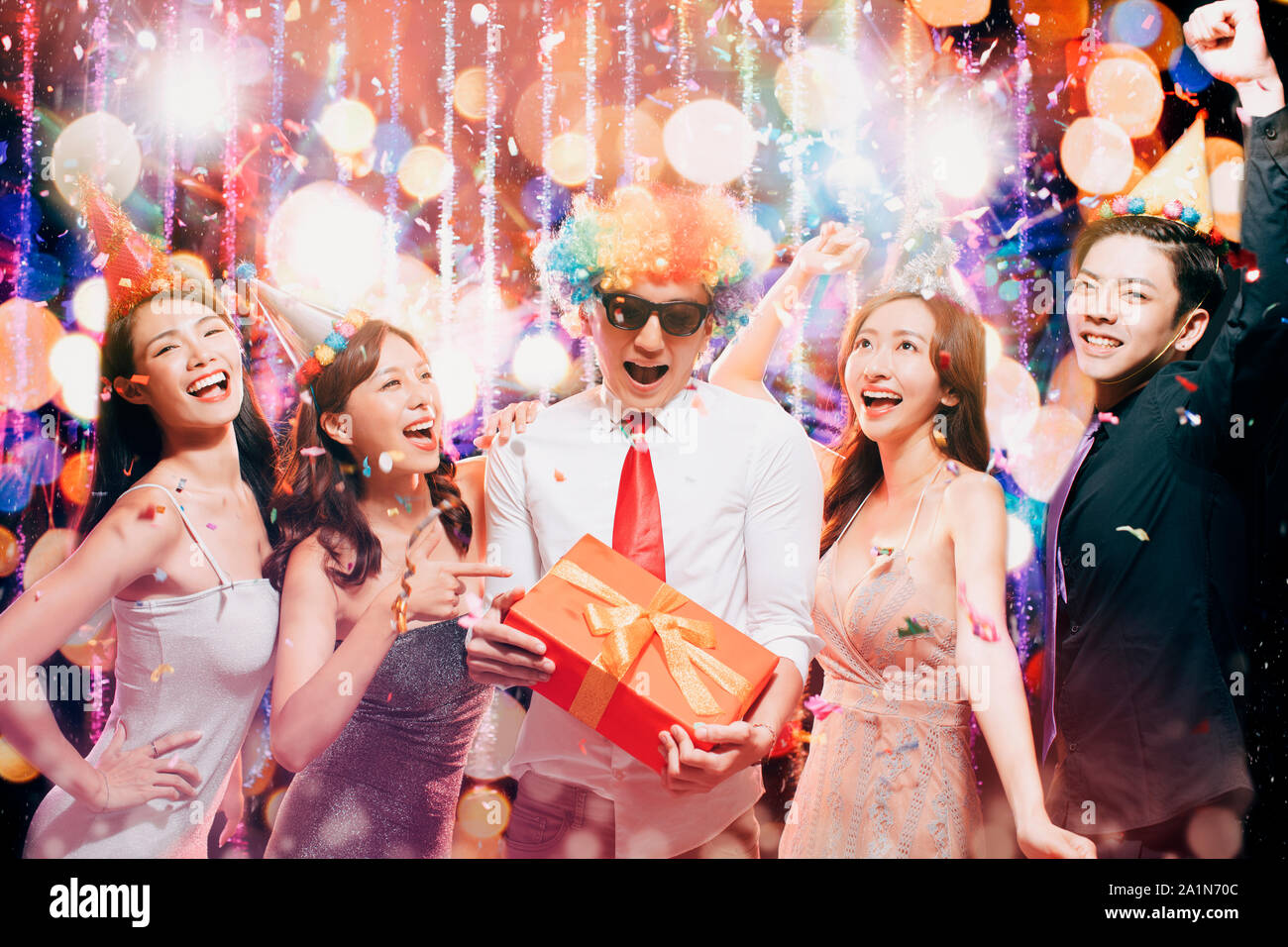 happy young group enjoy birthday party in night club Stock Photo - Alamy