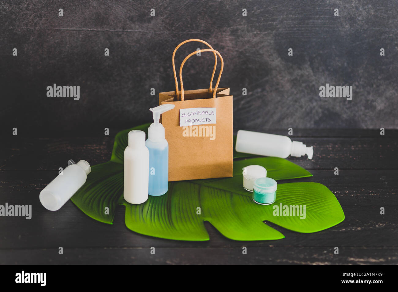 vegan beauty products concept, lotions and skincare on tropical leaf ...