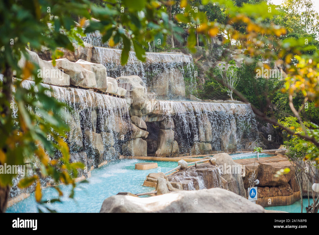 Artificial waterfall in the park of mineral springs Stock Photo - Alamy