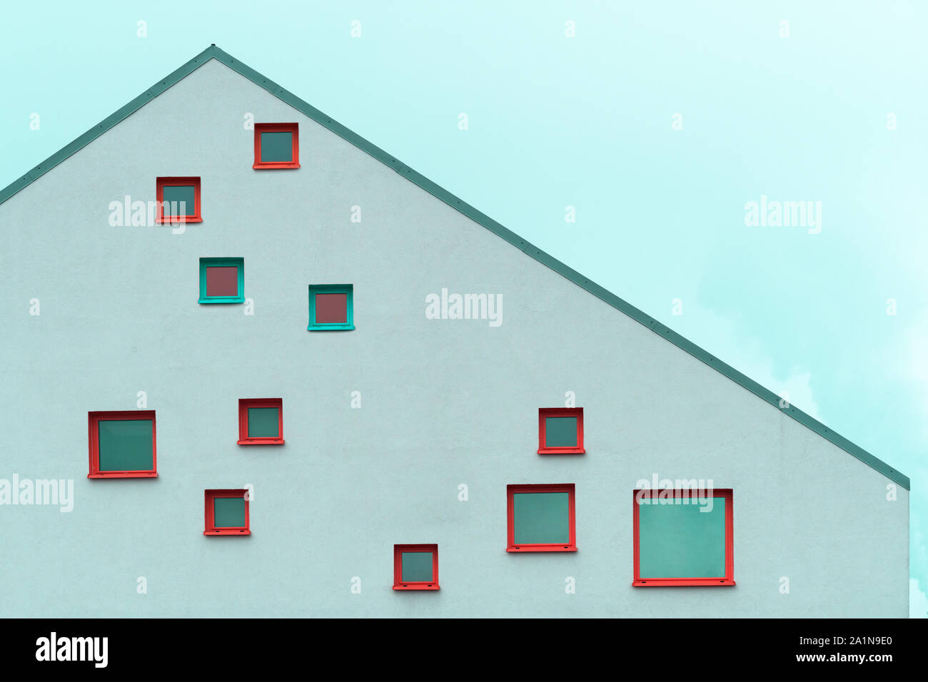 blue and red window square frame on grey white cement wall triangle ...