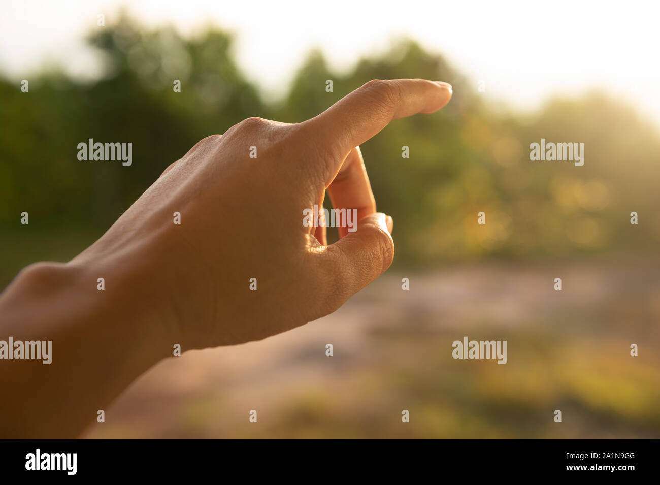 Pointing woman hand hi-res stock photography and images - Alamy