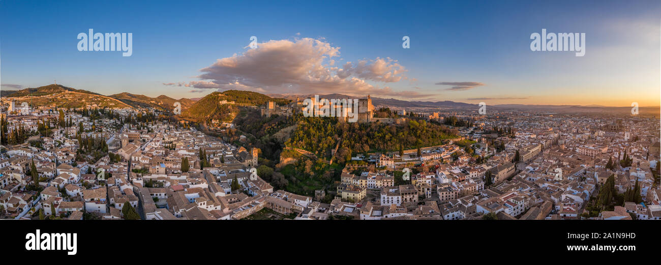 Aerial sunset panorama view of the Alhambra fortress and palace complex ...