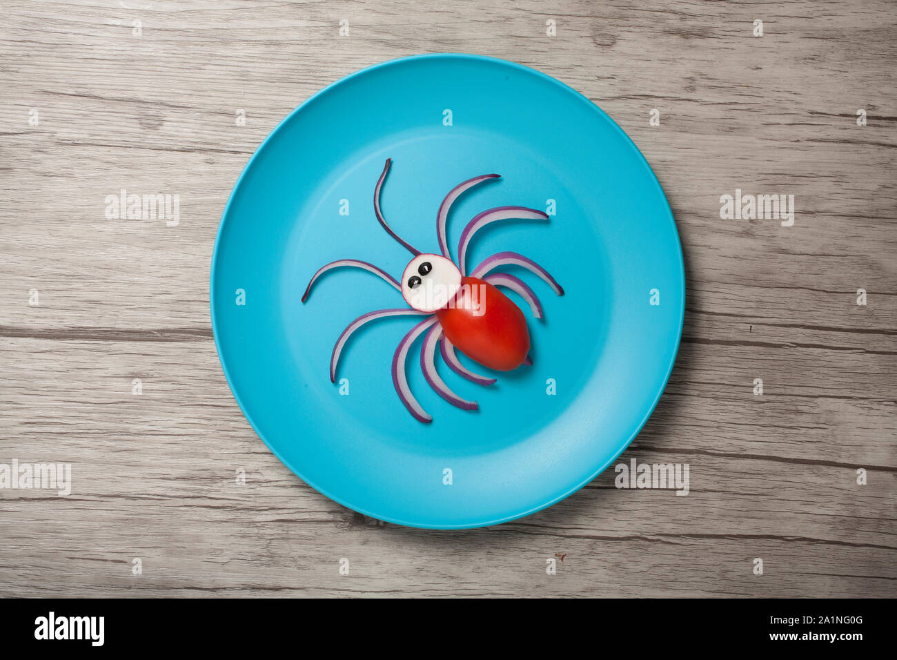 Easy receipt of making a spider with fresh vegetables Stock Photo - Alamy