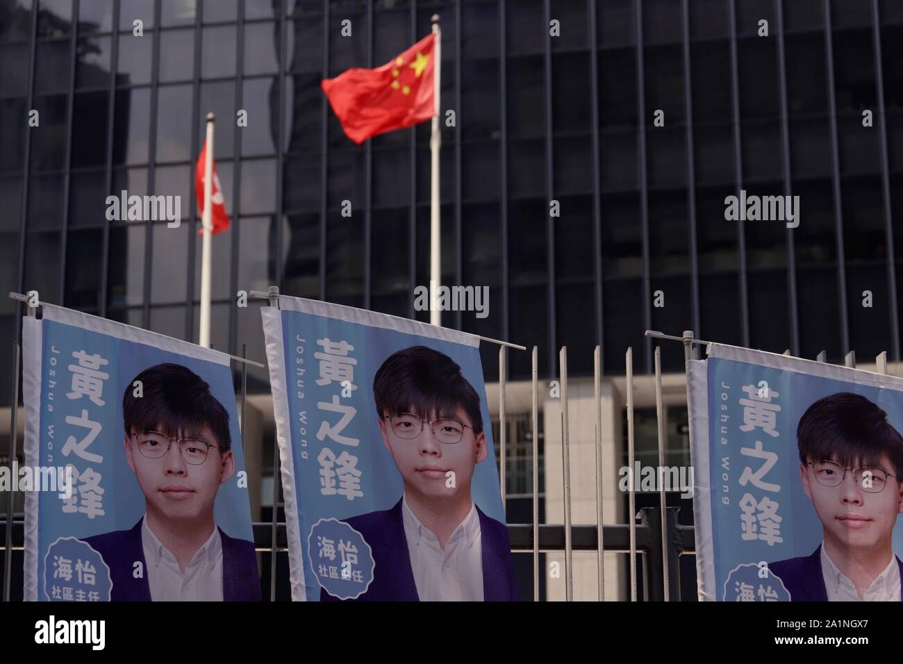 Hong Kong, CHINA. 28th Sep, 2019. PRC National Flag wave behind Joshua ...