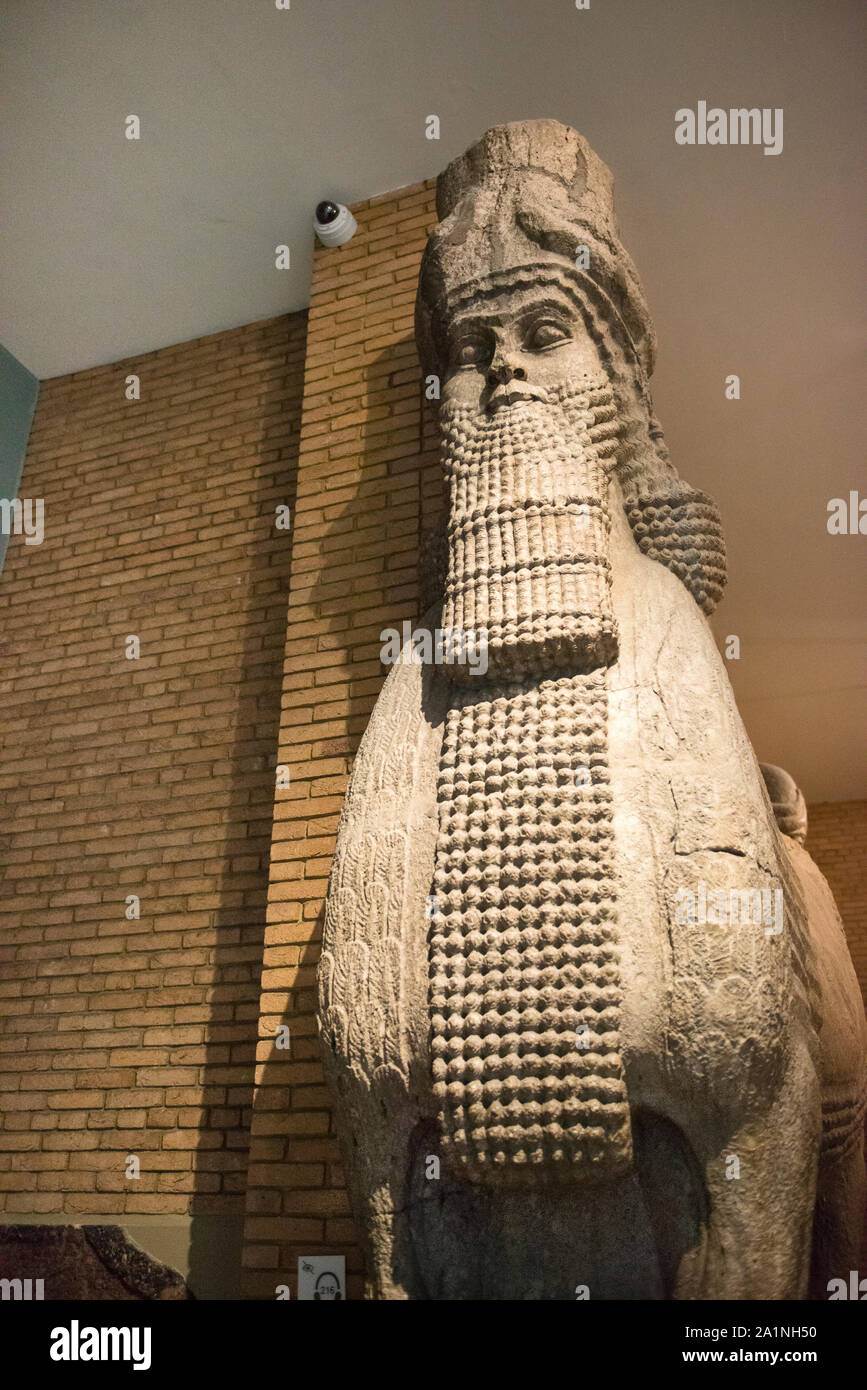 Colossal Assyrian Stone Sculpture of a human-headed winged bull from ...
