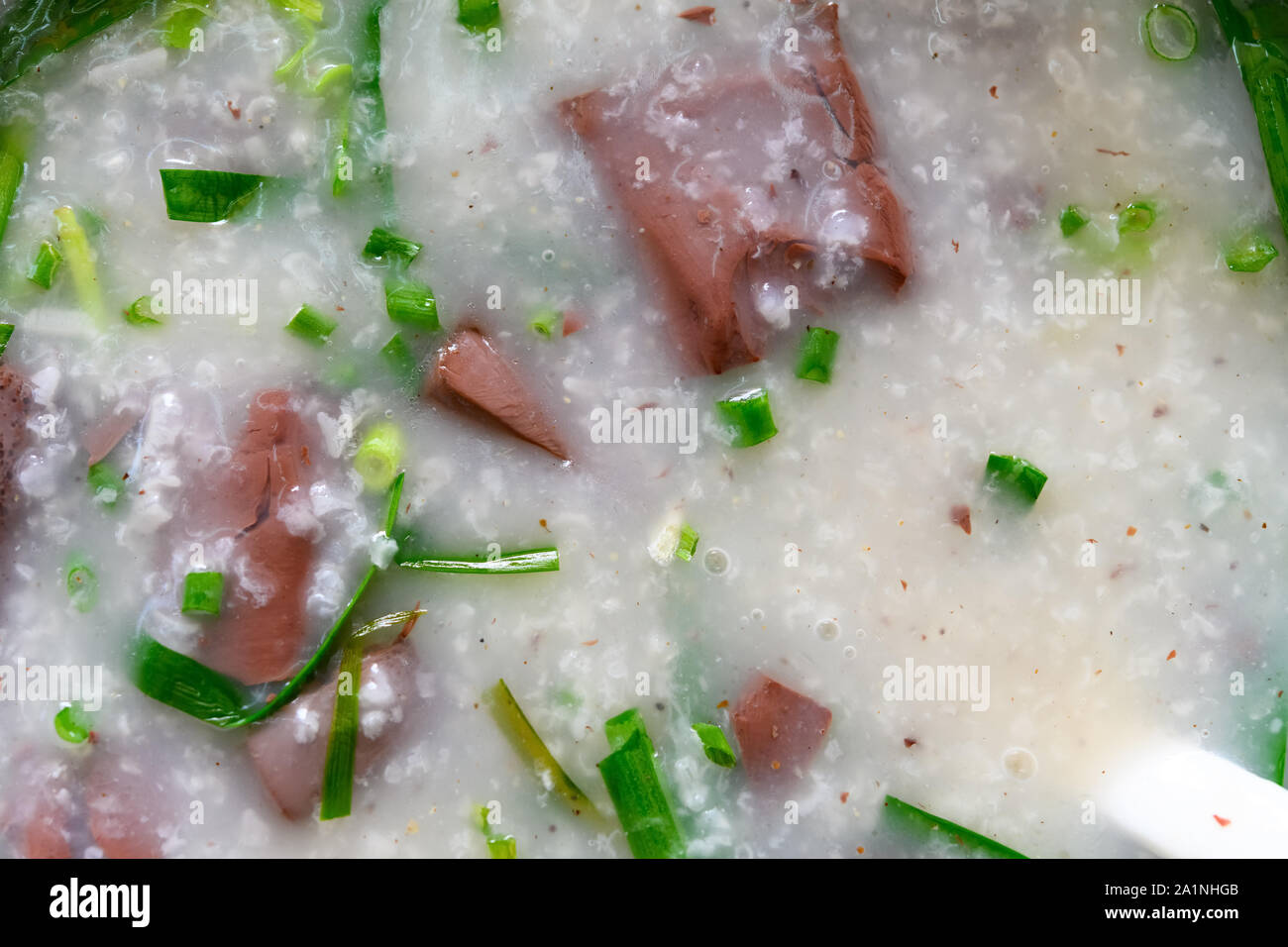 traditional Chinese porridge with pig blood and chives Stock Photo - Alamy