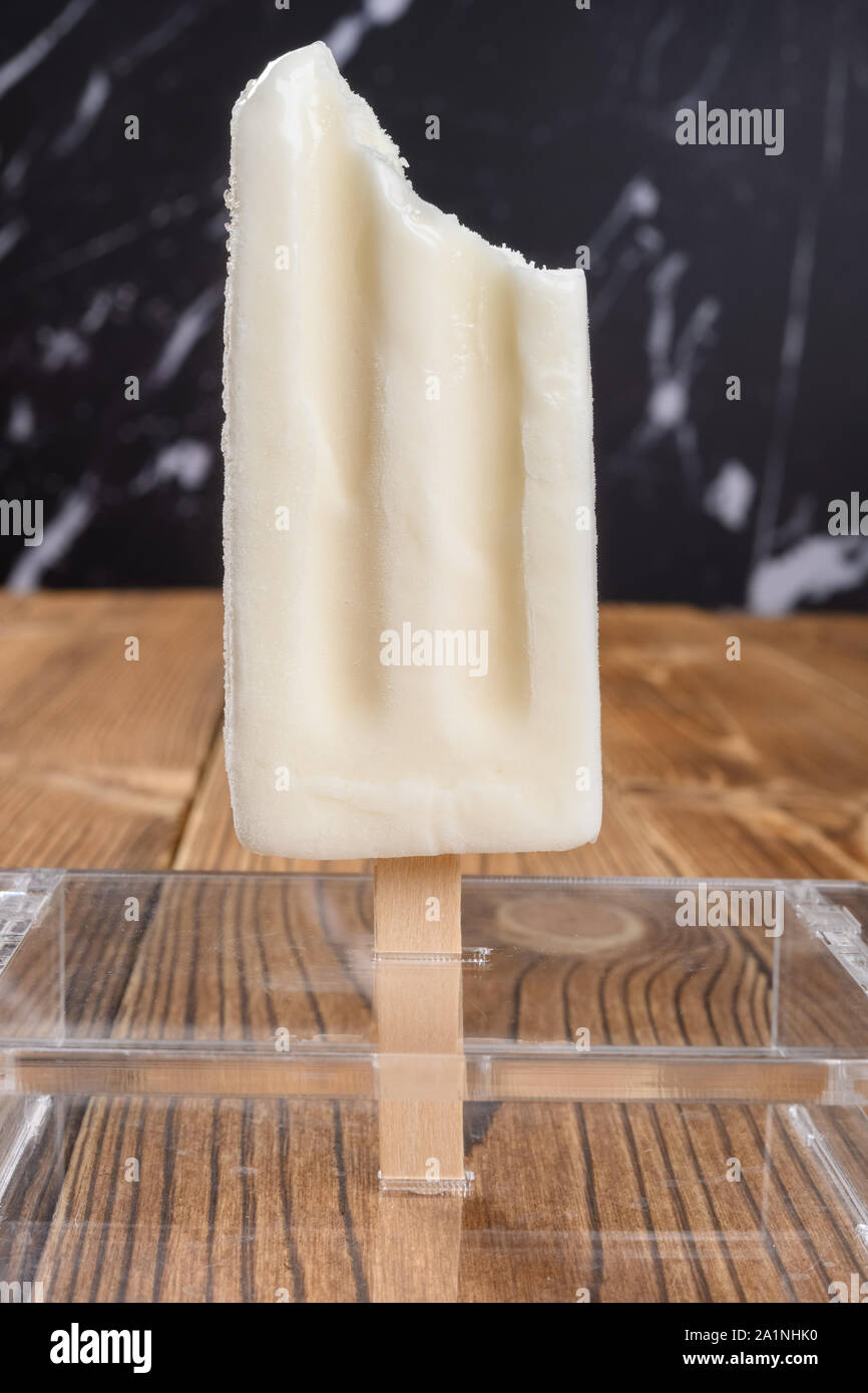 popsicle with a big bite Stock Photo - Alamy