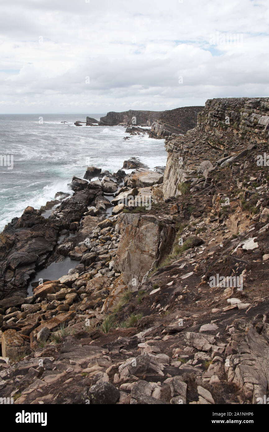 Coastal cliffs at Cape Tamar Pebble Island Falkland Islands Stock Photo ...